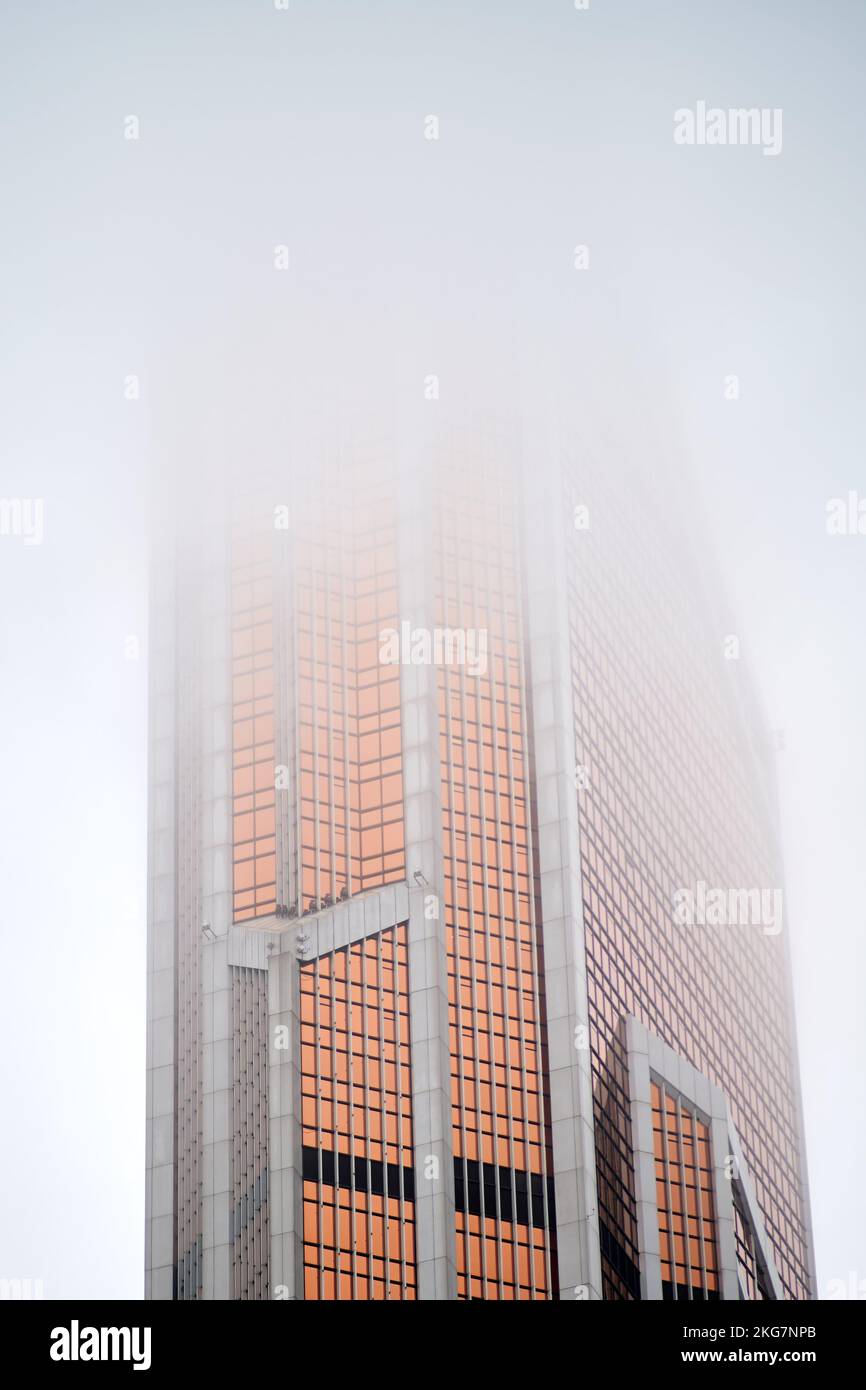 Windows of skyscrapers in the fog, background copy space. Metal ...