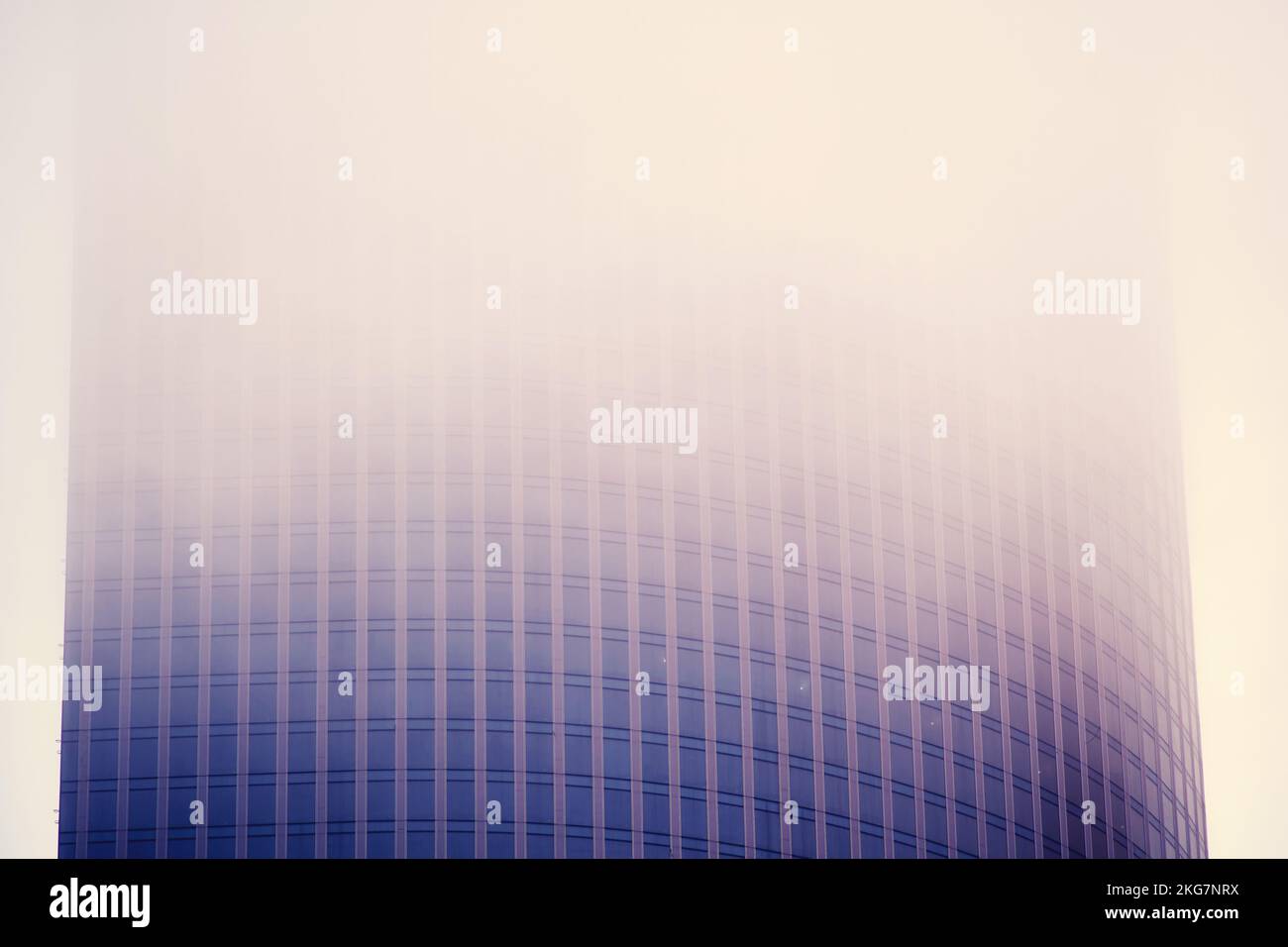 Windows of skyscrapers in the fog, background copy space. Metal ...