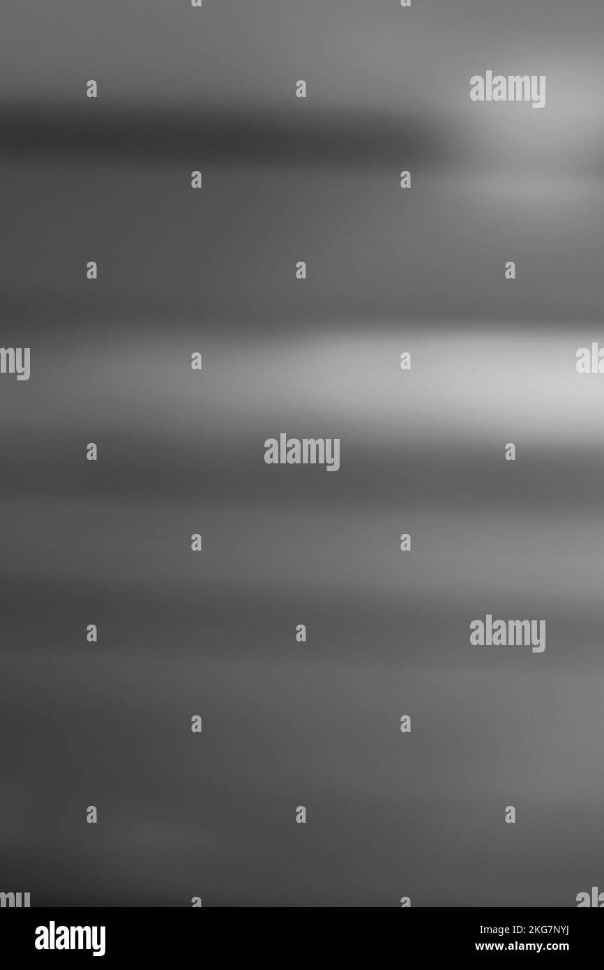 Unusual abstract blurry dreamy texture in a black and white monochrome ...