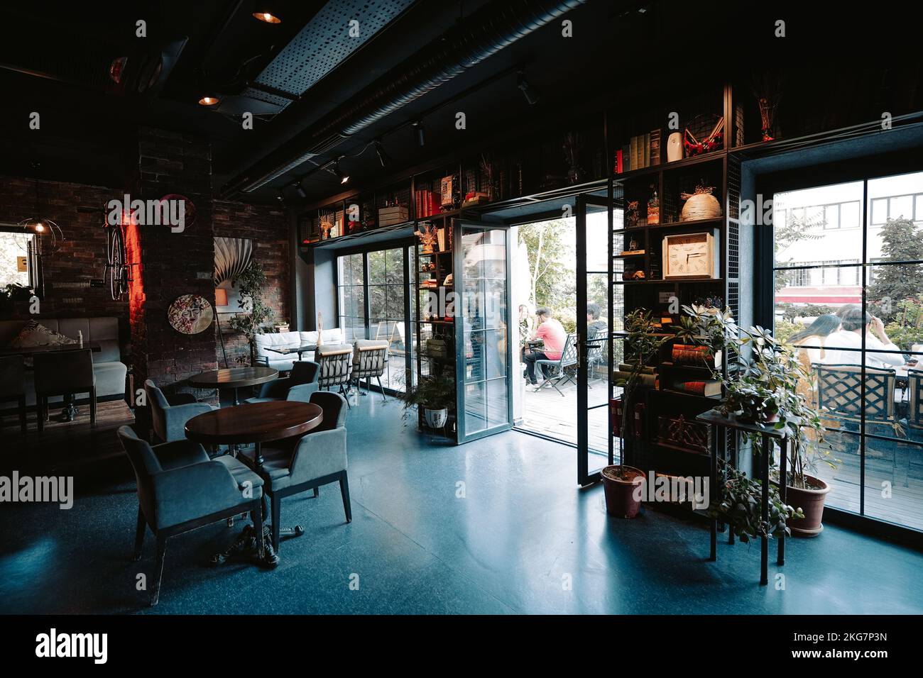 Books on shelves in restaurant and library Stock Photo - Alamy