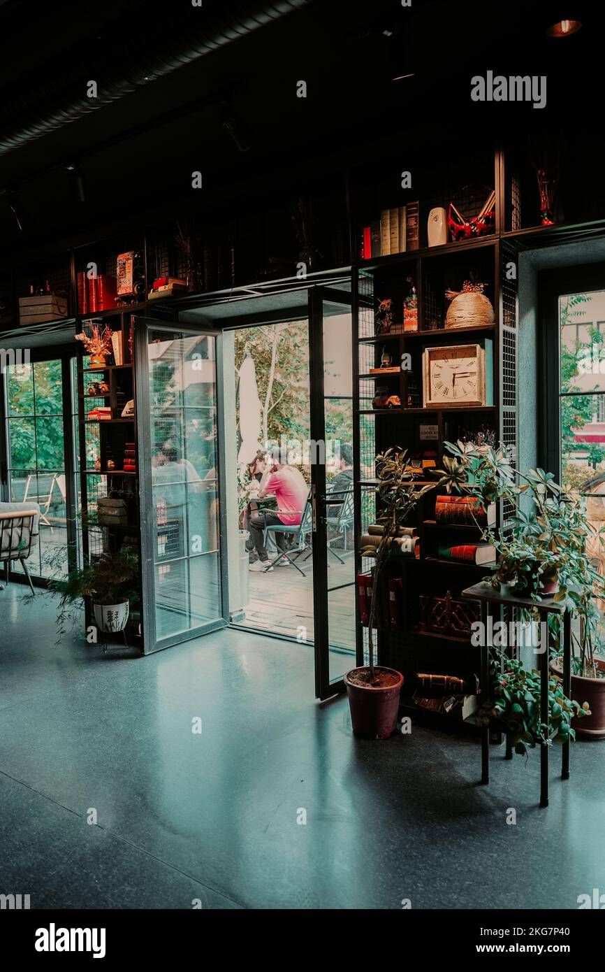 Books on shelves in restaurant and library Stock Photo - Alamy