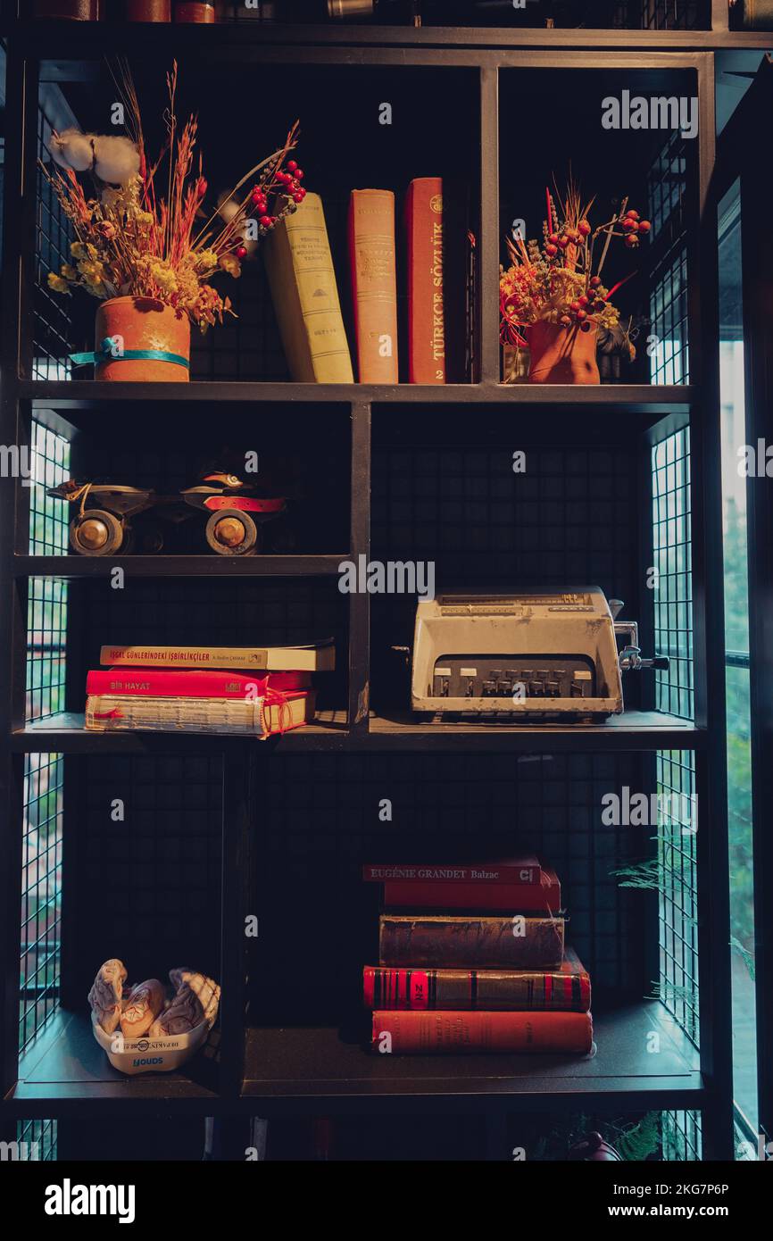 Books on shelves in restaurant and library Stock Photo - Alamy