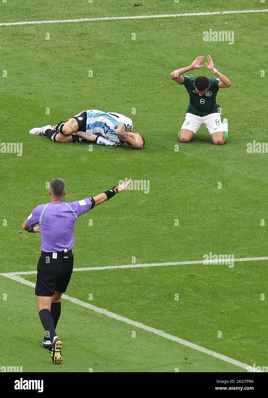 Lusail, Qatar. 22nd Nov, 2022. Abdulelah Almalki (R) of Saudi Arabia ...