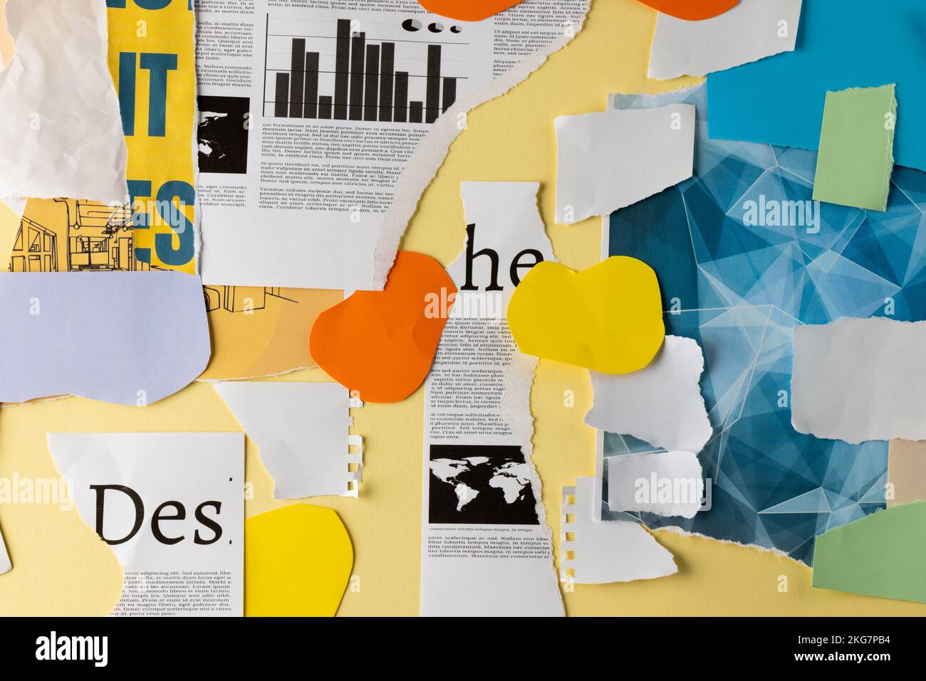 Ripped up pieces of notebooks, newspaper and coloured paper arranged on ...