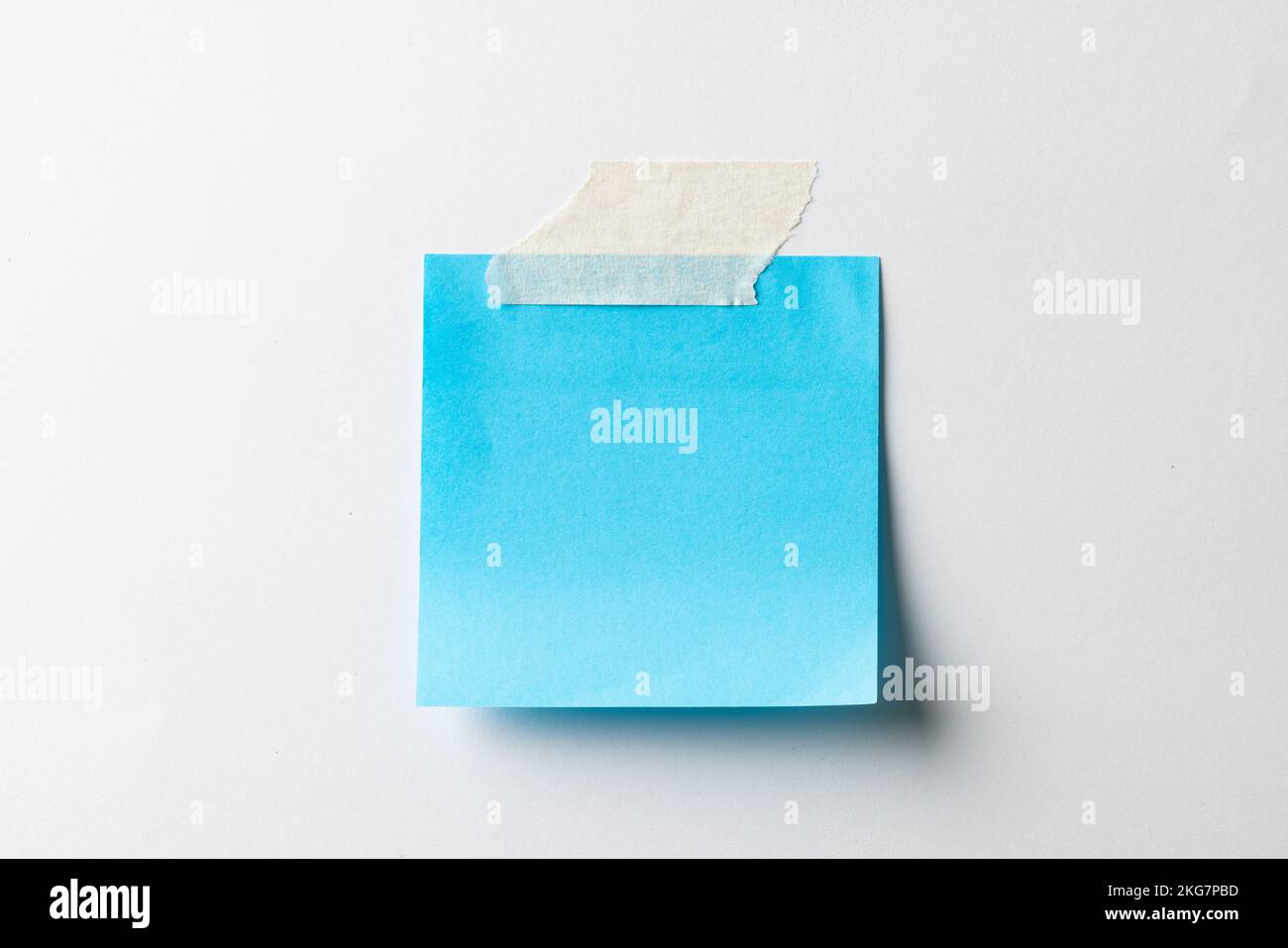 Blue sticky memo note with copy space on white background Stock Photo ...