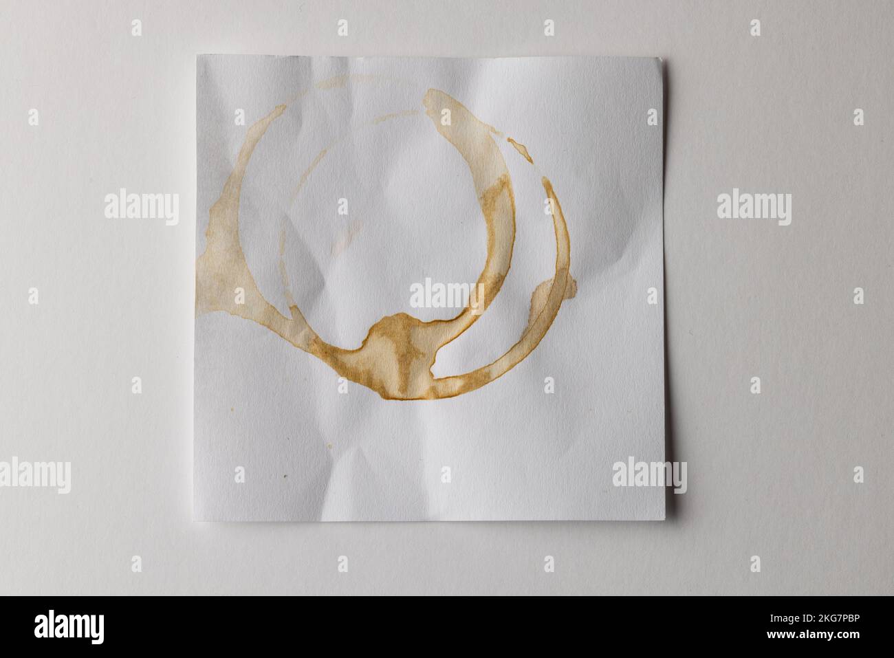 White stained memo note with copy space on white background Stock Photo ...