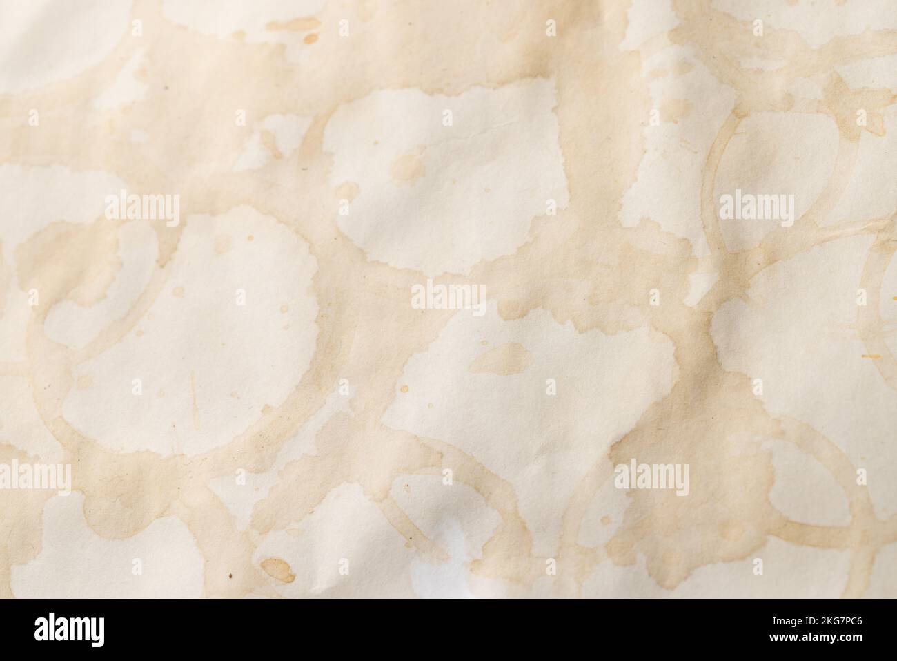 White stained piece of paper with copy space on white background Stock ...