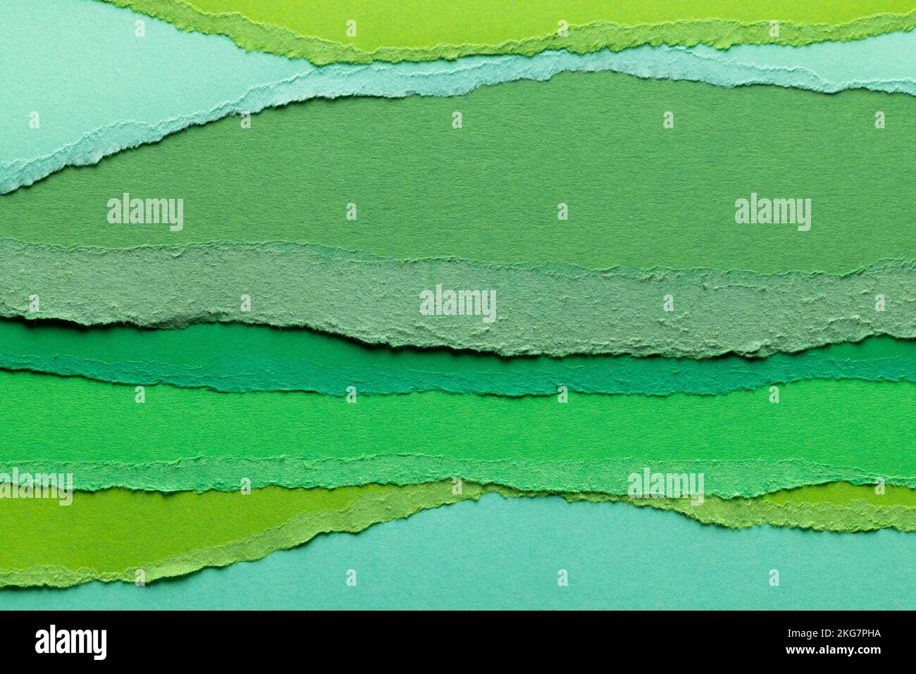 Ripped up pieces of coloured paper with copy space Stock Photo - Alamy