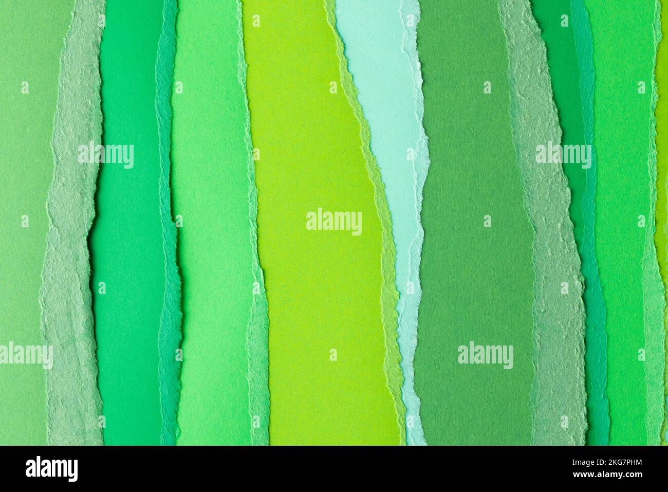 Ripped up pieces of coloured paper with copy space Stock Photo - Alamy