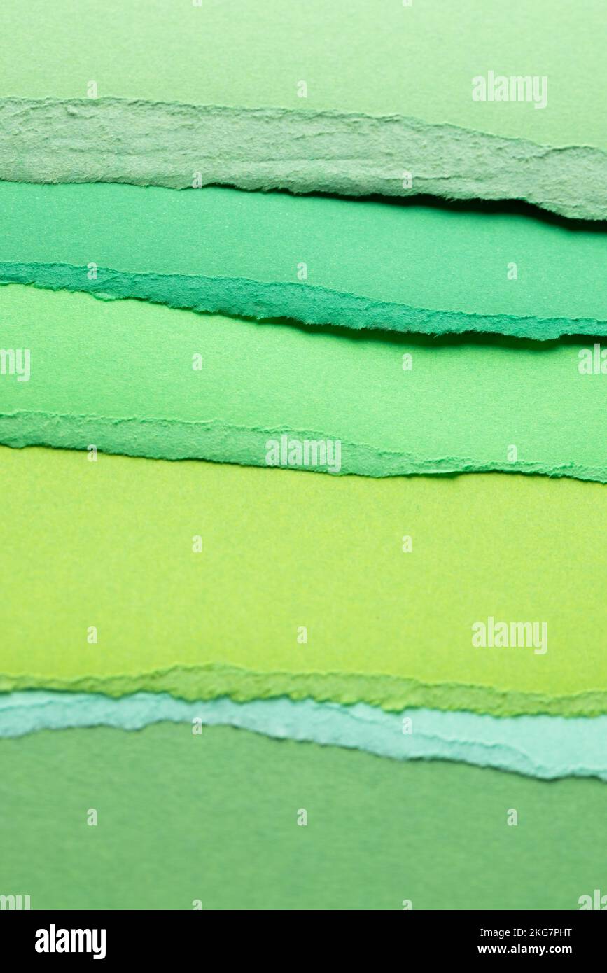 Ripped up pieces of coloured paper with copy space Stock Photo - Alamy