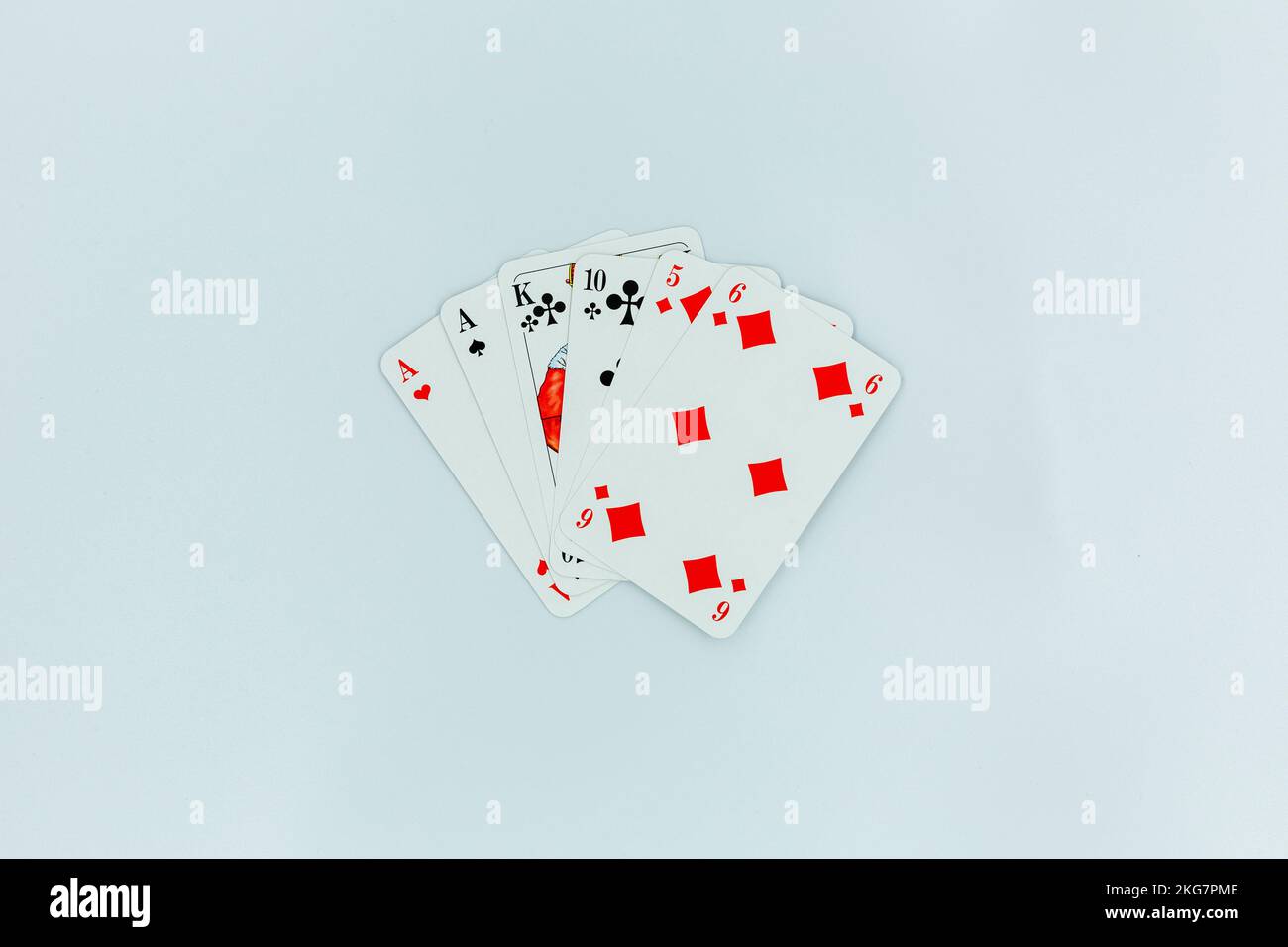 poker playing cards on a white background Stock Photo - Alamy