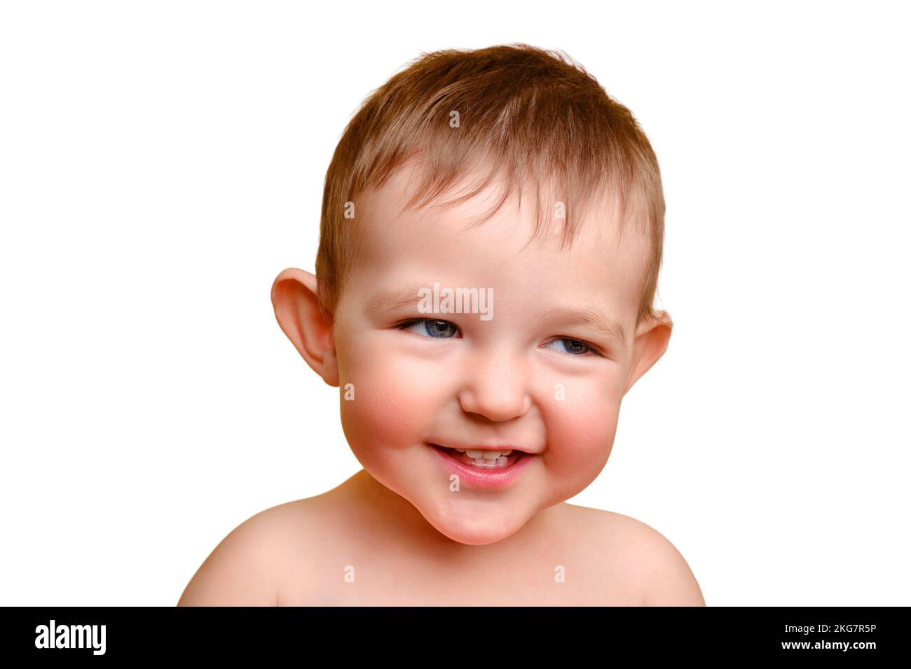 Sly toddler baby, studio white background, copy space. Portrait of an ...