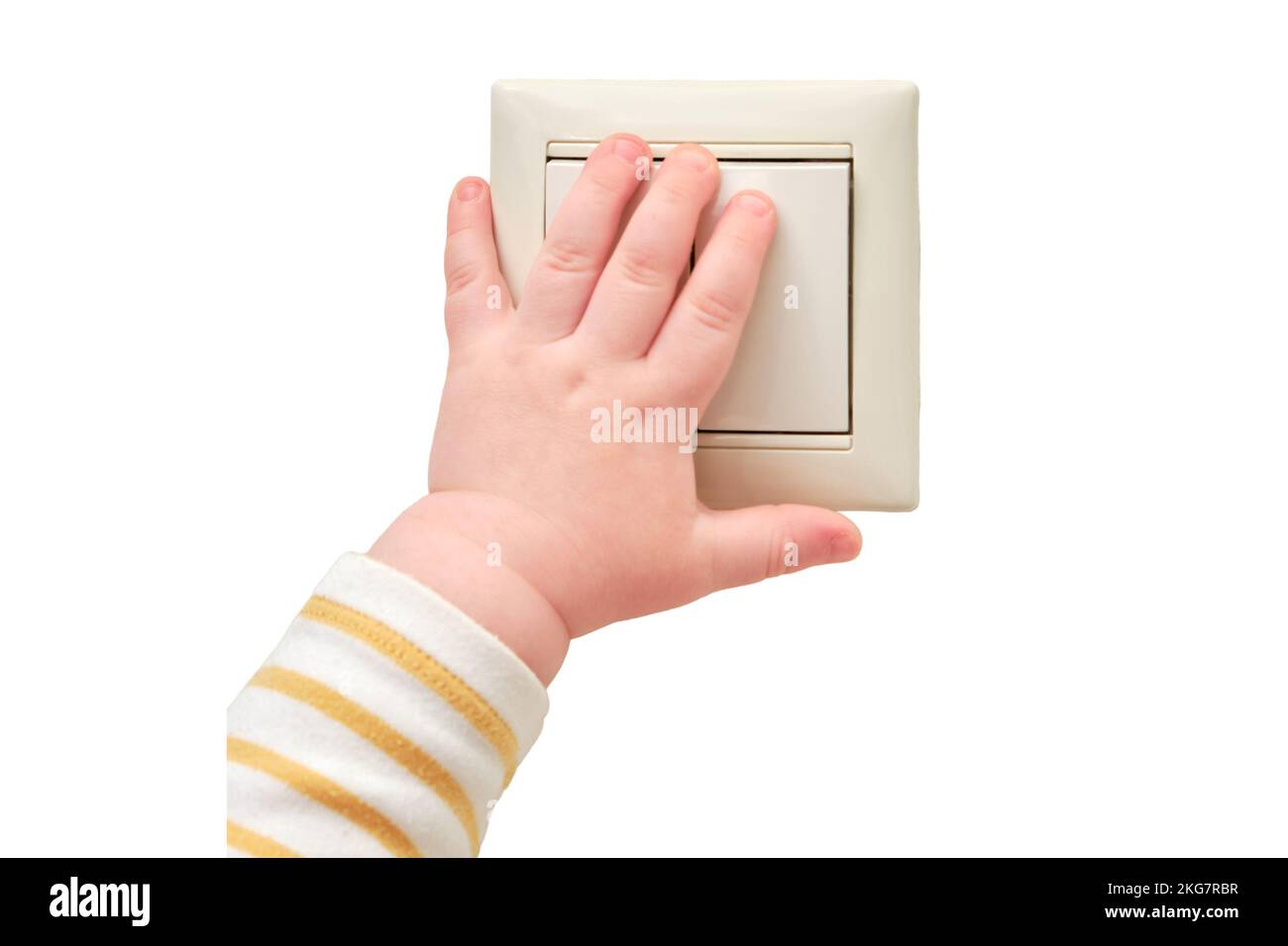 Toddler baby boy turns the light on and off with an electric switch ...