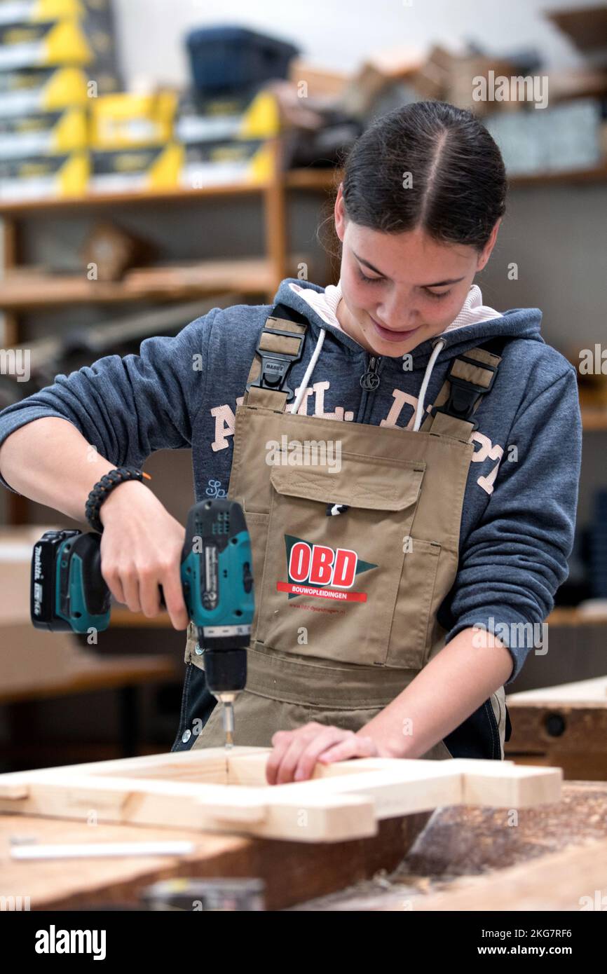 secondary school student works with a drilll. 2018 holland. vvbvanbree ...