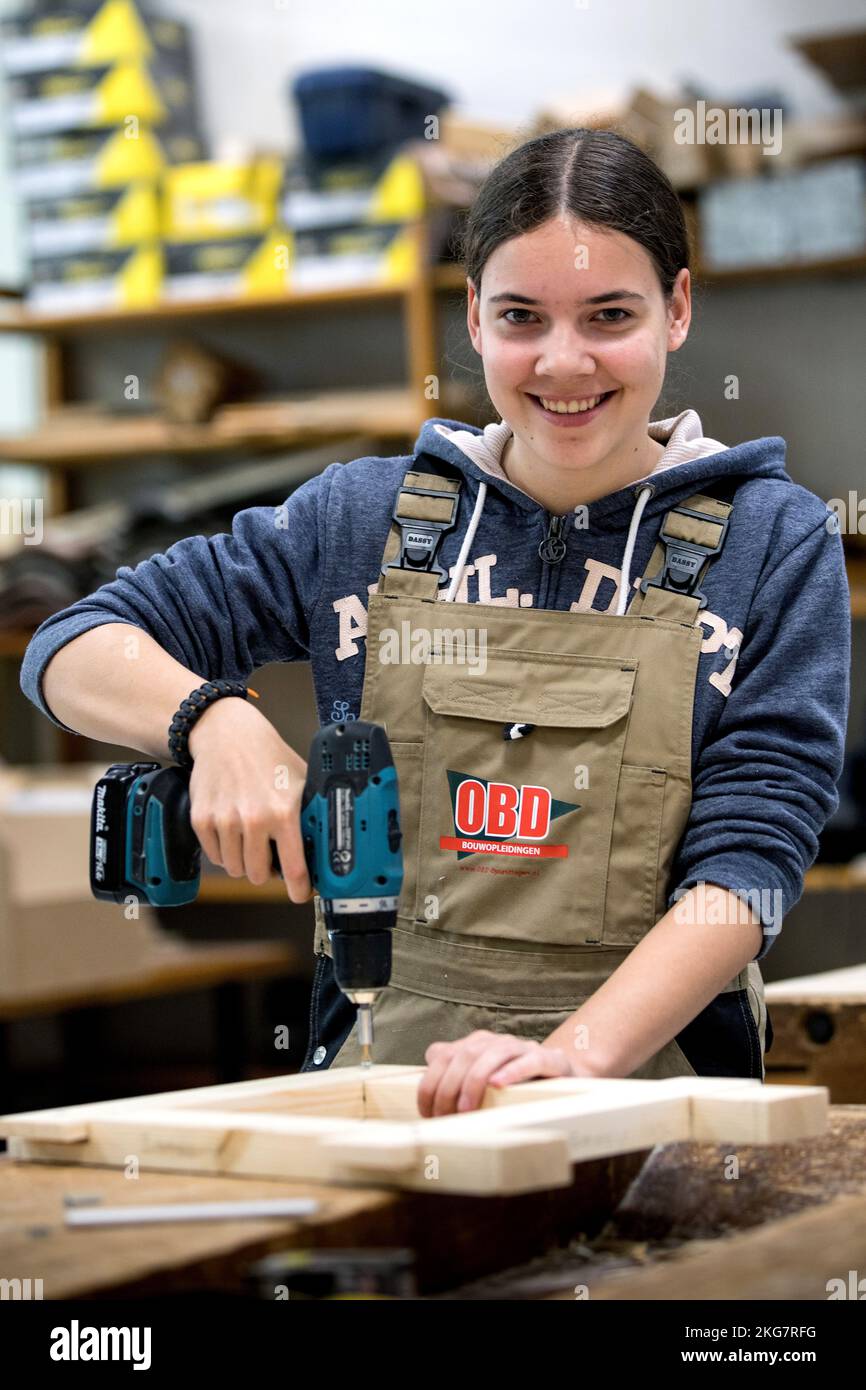 secondary school student works with a drilll. 2018 holland. vvbvanbree ...