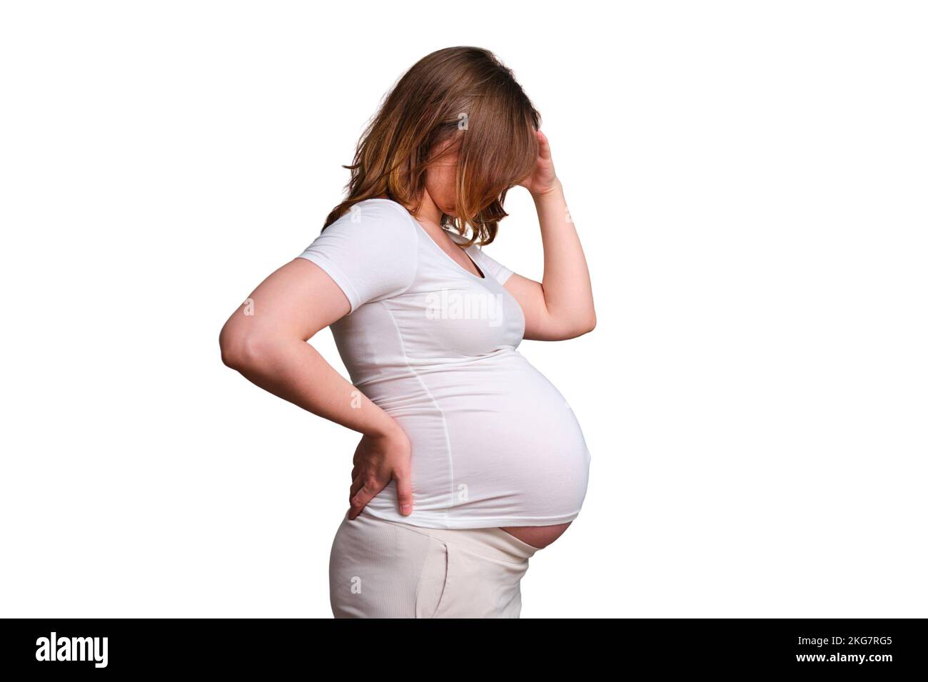 Emotion of worries and problems in a pregnant woman, studio shot on a ...