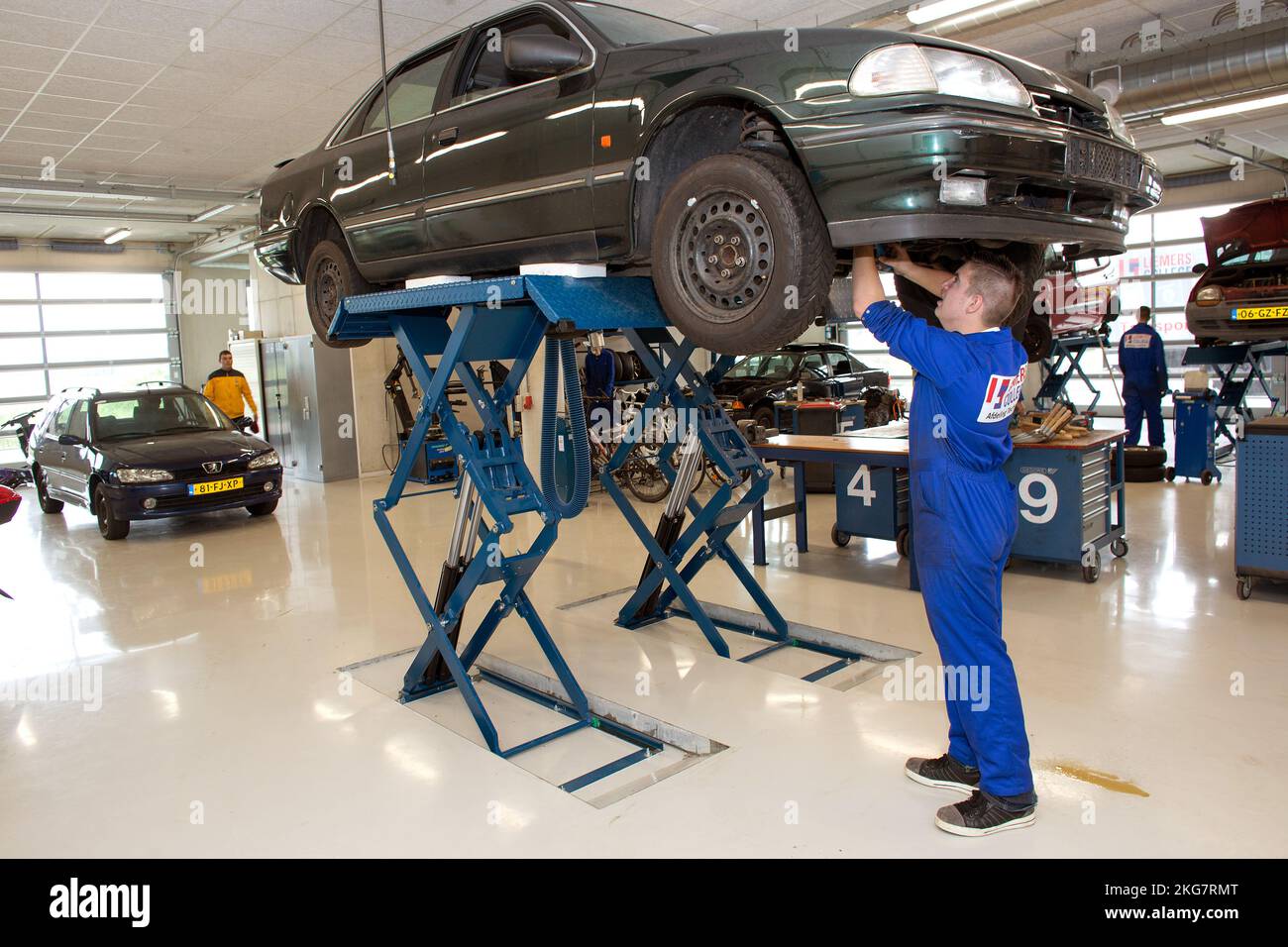 secondary school student working on a car engine. 2018 holland ...