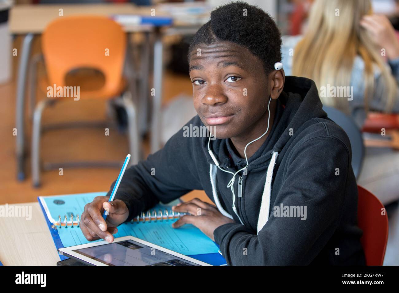 Student working in a classroom in a secondary school. Holland ...
