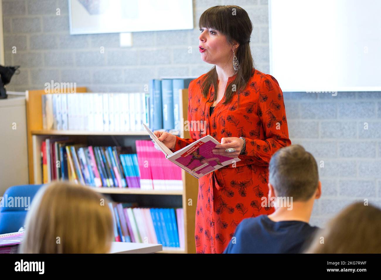Teacher with students in a classroom in a secondary school. Holland ...