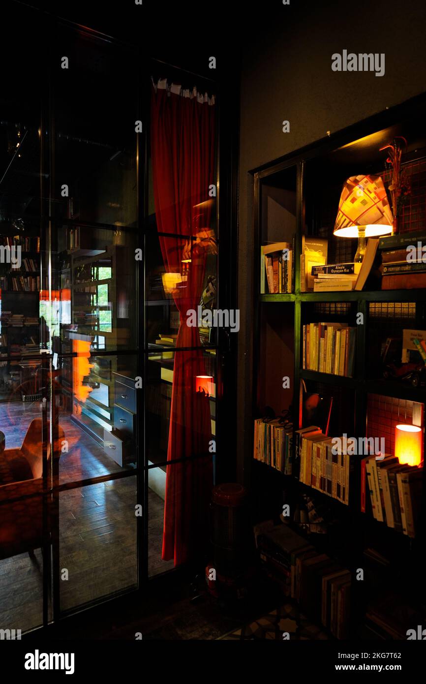 Books on shelves in restaurant and library Stock Photo - Alamy