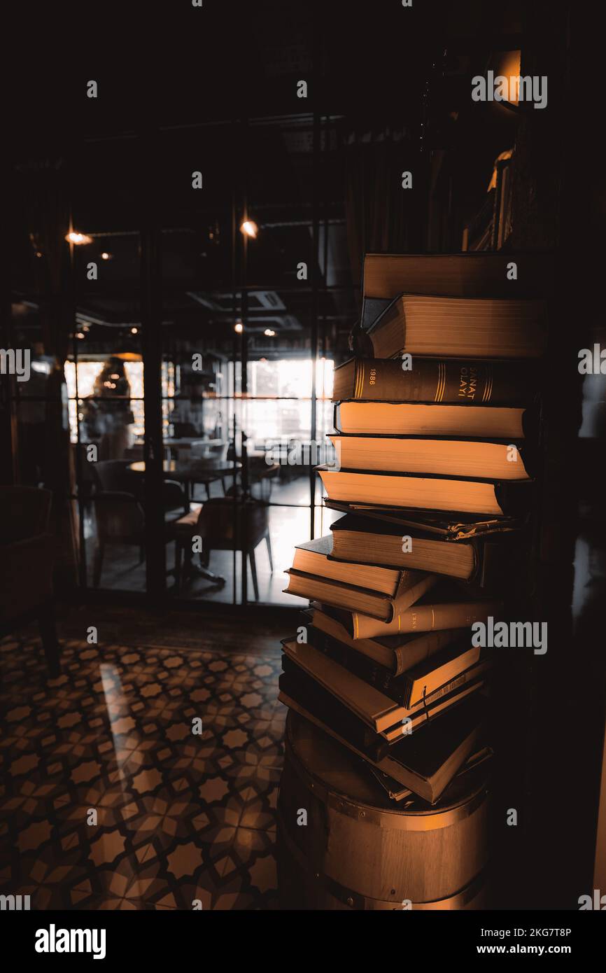 Books on shelves in restaurant and library Stock Photo - Alamy
