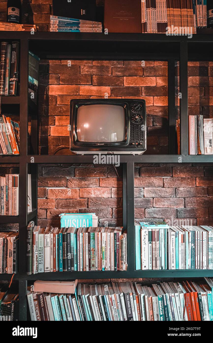 Books on shelves in restaurant and library Stock Photo - Alamy
