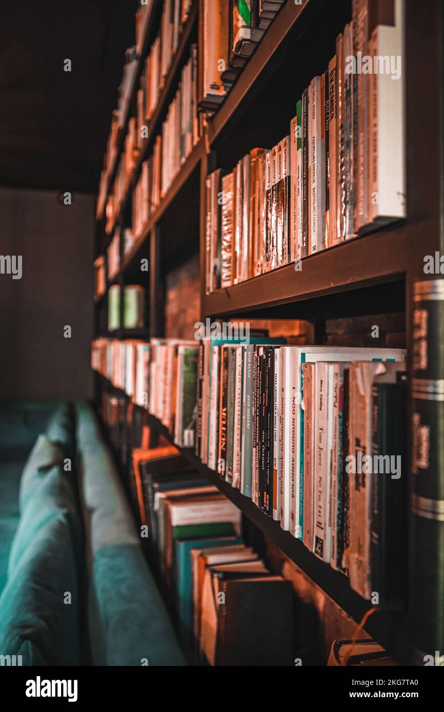 Books on shelves in restaurant and library Stock Photo - Alamy