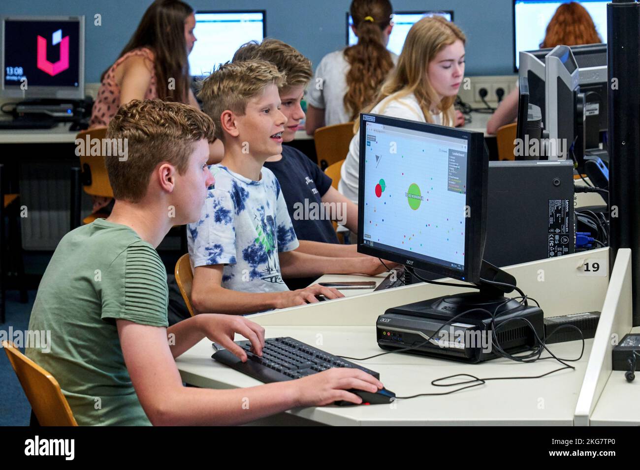 Students on a secondary school working with computers in a classroom ...