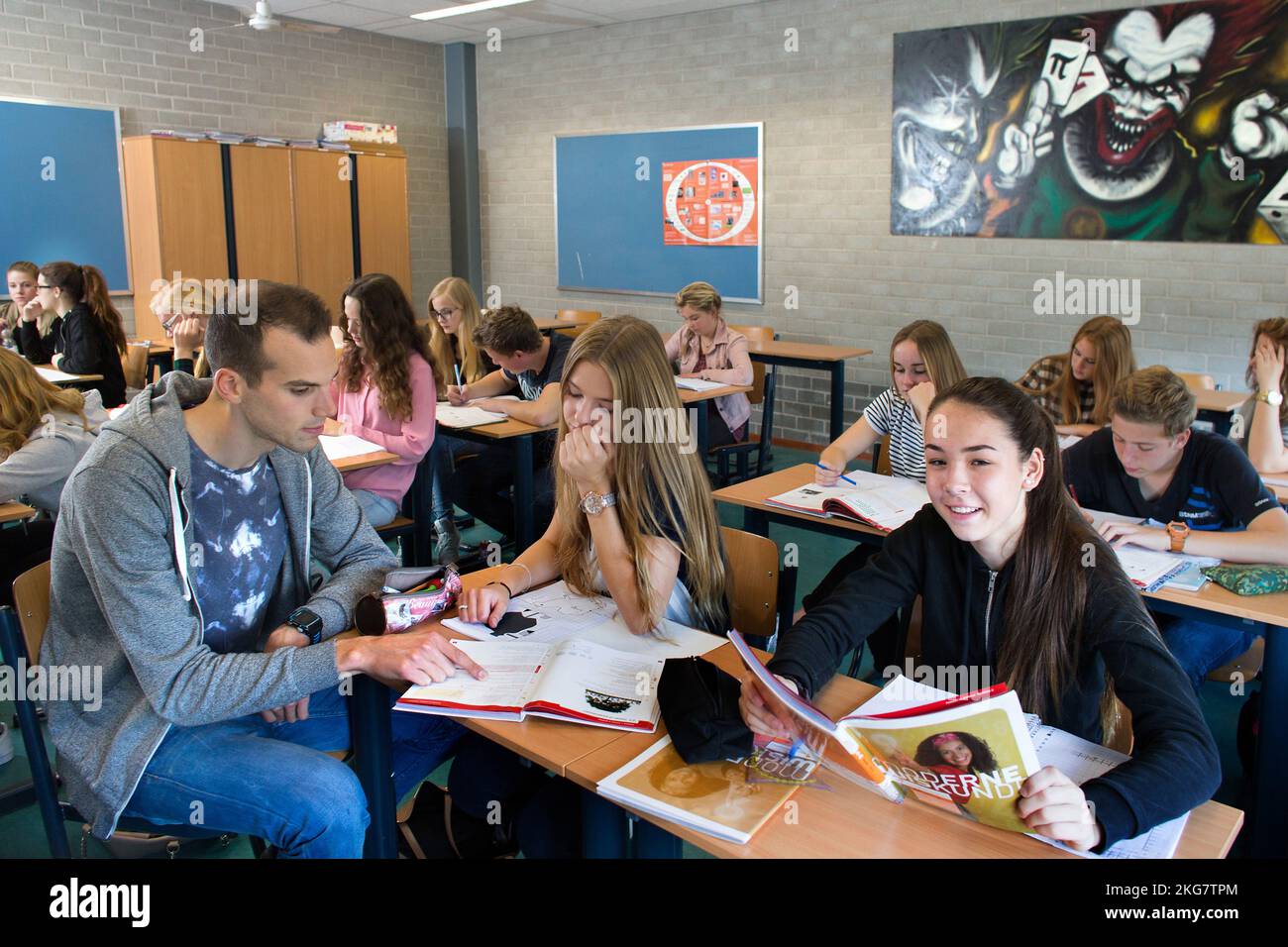 Teacher in a classroom in a secondary school. Holland. vvbvanbree ...