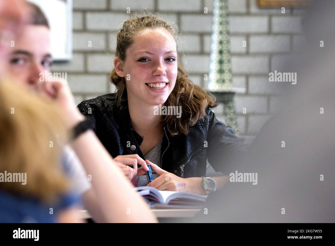 Student working in a classroom in a secondary school. Holland ...