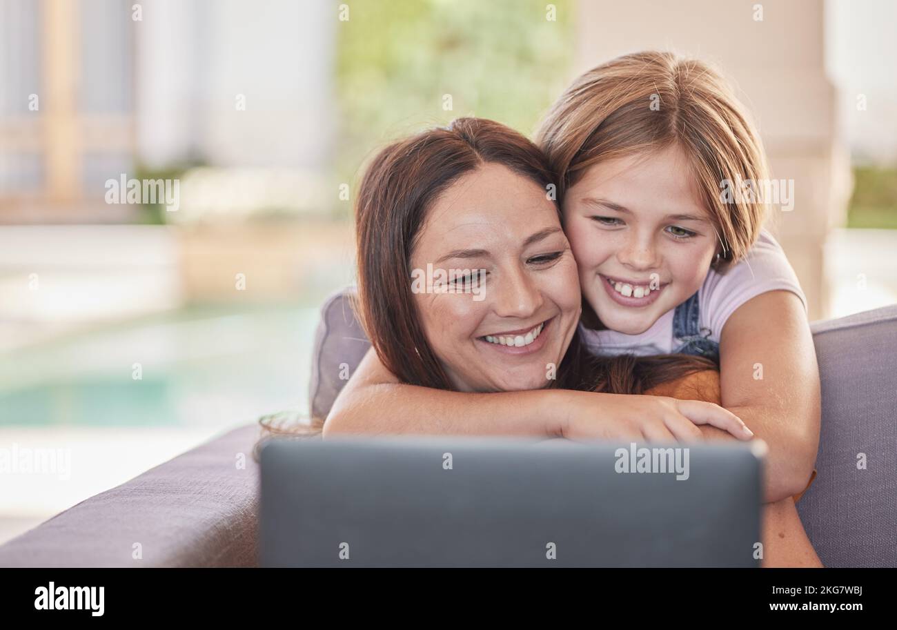 Mom, child and sofa with laptop, smile or happy for video, streaming or ...