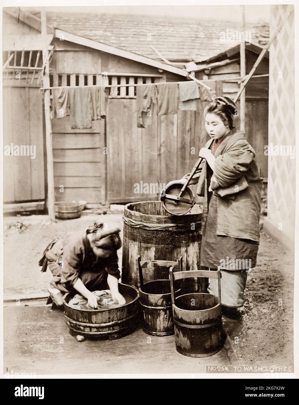 Vintage 19th century photograph: Women washing clothes, Japan Stock ...