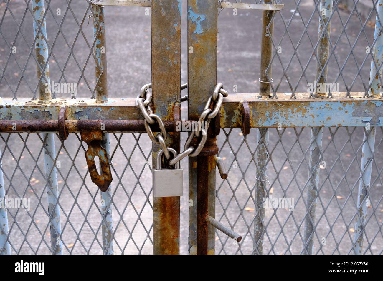 A locked iron gate for security Stock Photo - Alamy