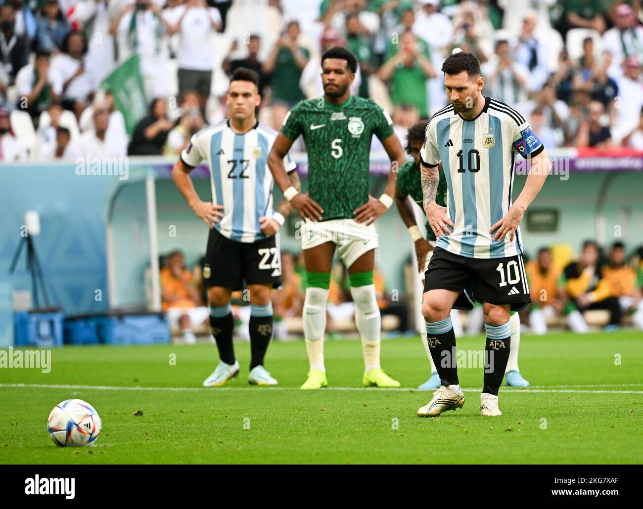 Lusail, Qatar. 22nd Nov, 2022. Lionel Messi (front) of Argentina reacts ...