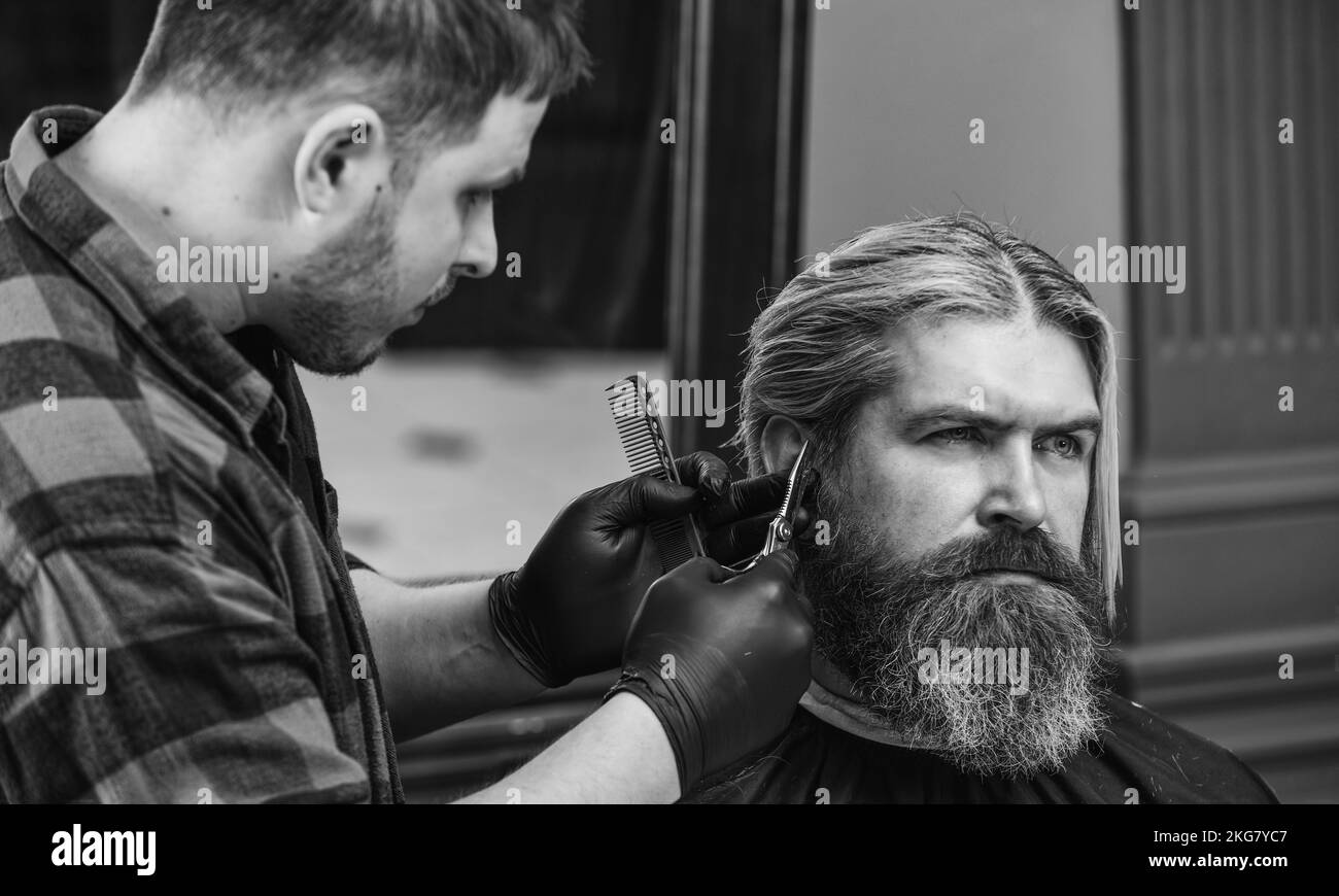 Confident in his perfect style. handsome brutal man. grooming hair in ...