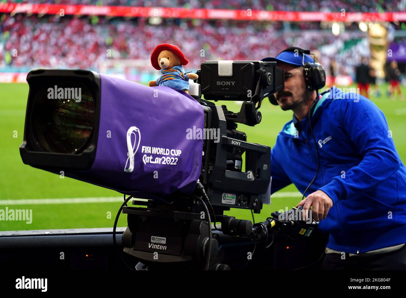 A teddy bear wearing rainbow laces on top of a television camera during ...