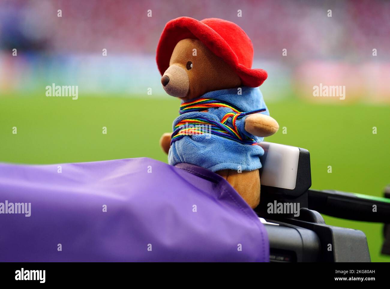 A teddy bear wearing rainbow laces on top of a television camera during ...