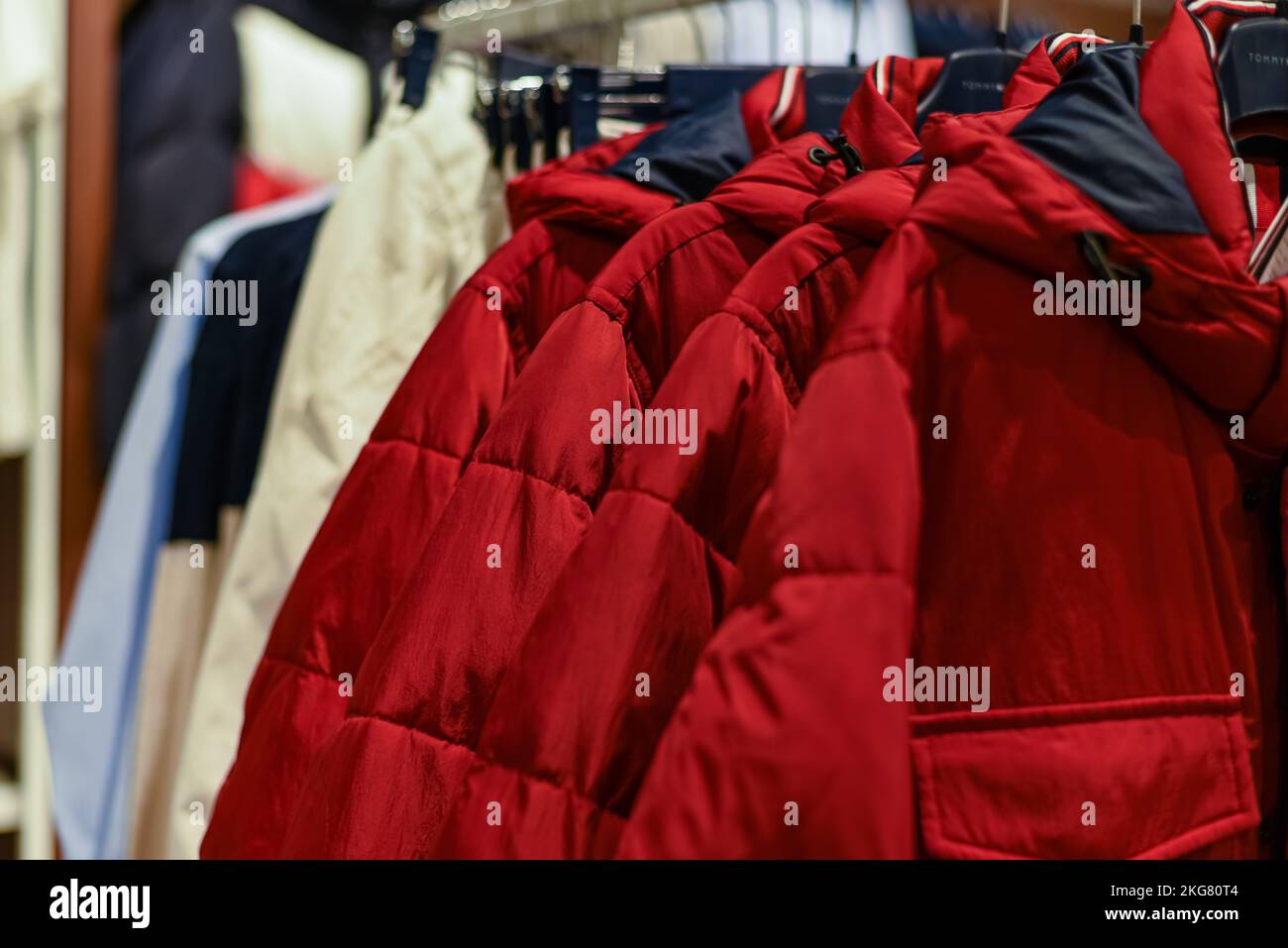 warm winter jackets shop showcase wardrobe Stock Photo - Alamy