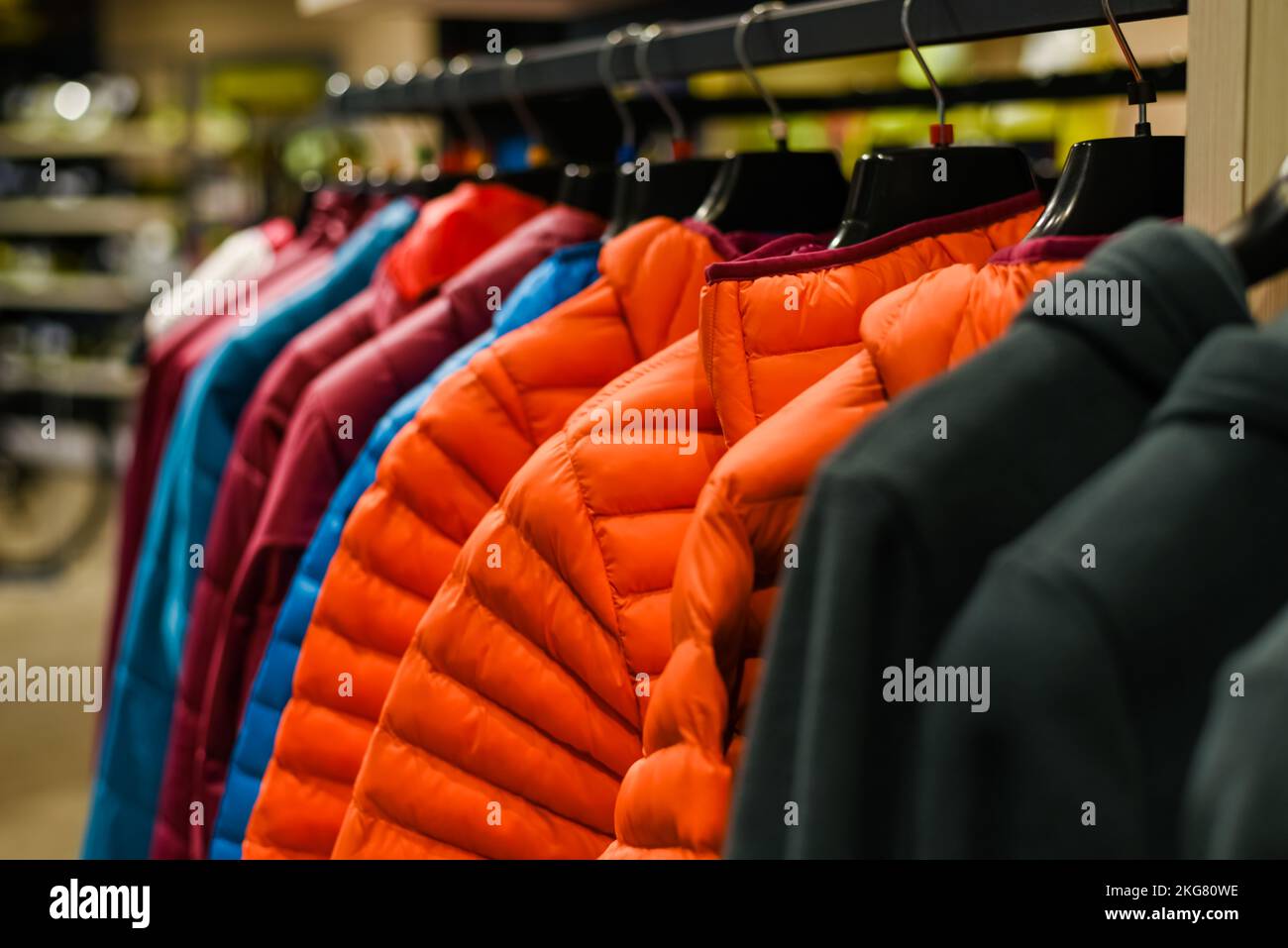warm winter jackets shop showcase wardrobe Stock Photo - Alamy