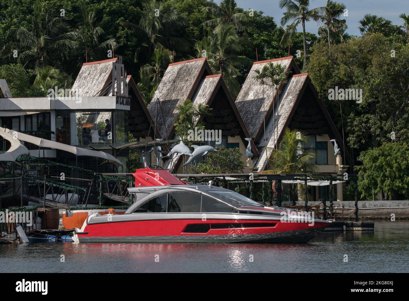 speedboat parked outside a waterfront villa Stock Photo - Alamy
