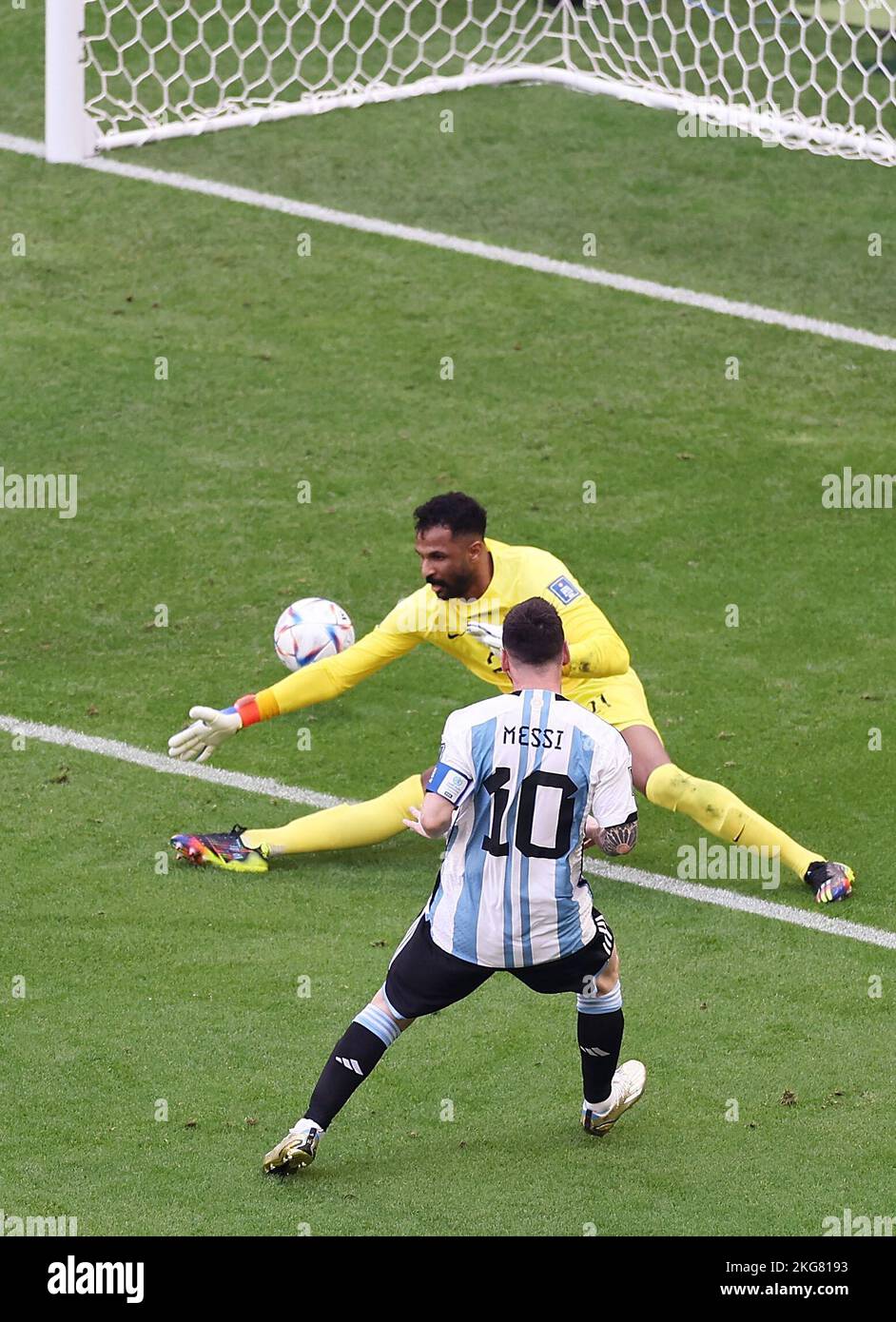 Lusail, Qatar. 22nd Nov, 2022. Lionel Messi (bottom) of Argentina ...
