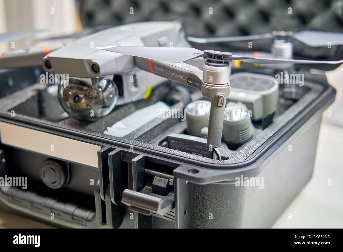 A drone with a camera in a box on a store shelf. Sale of drones in the ...