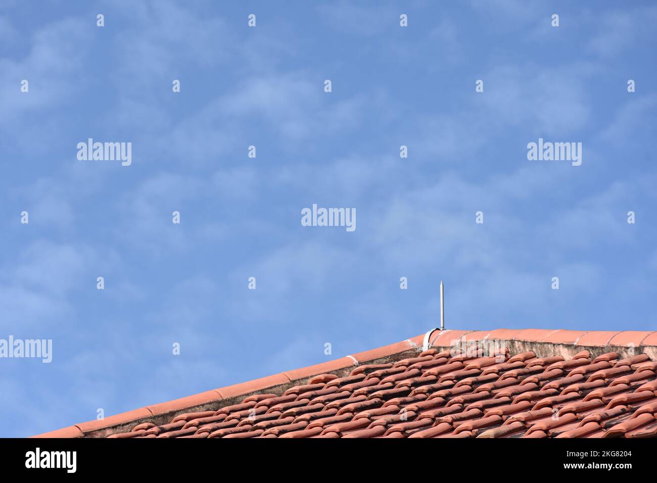 An aerial view of building roof in background of sky Stock Photo - Alamy