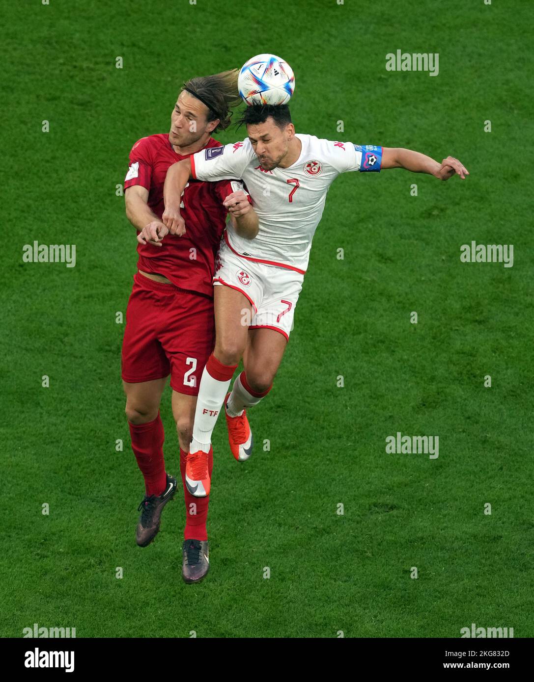 Tunisia's Youssef Msakni (right) and Denmark's Joachim Andersen battle ...
