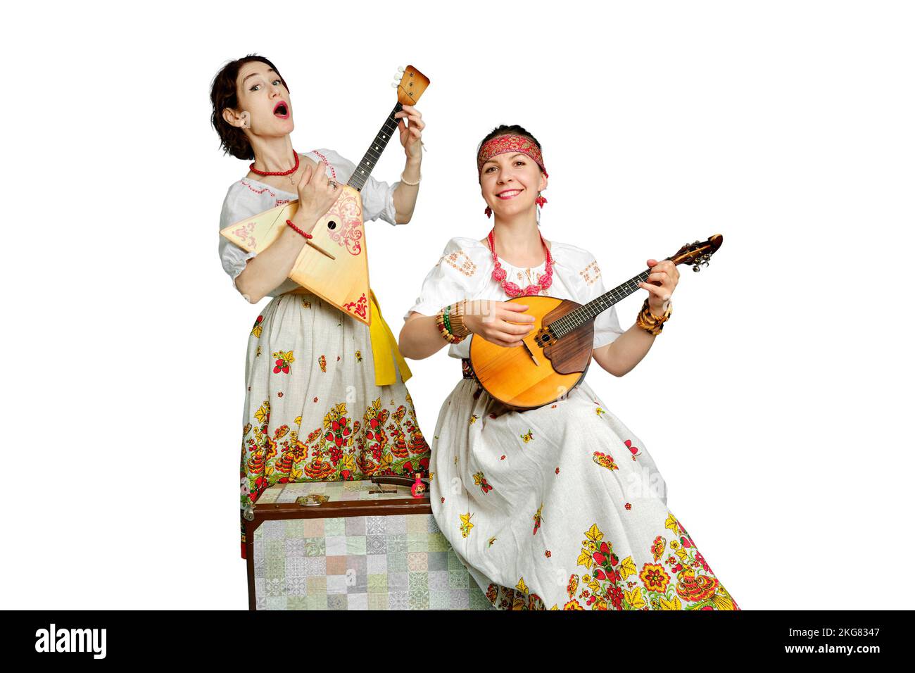 Women musicians in Russian folk dresses with musical instruments on a ...