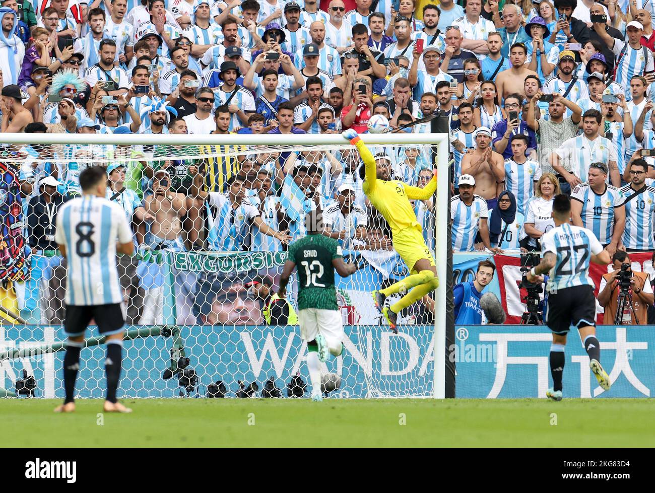 Lusail, Qatar. 22nd Nov, 2022. Mohammed Alowais (top), goalkeeper of ...