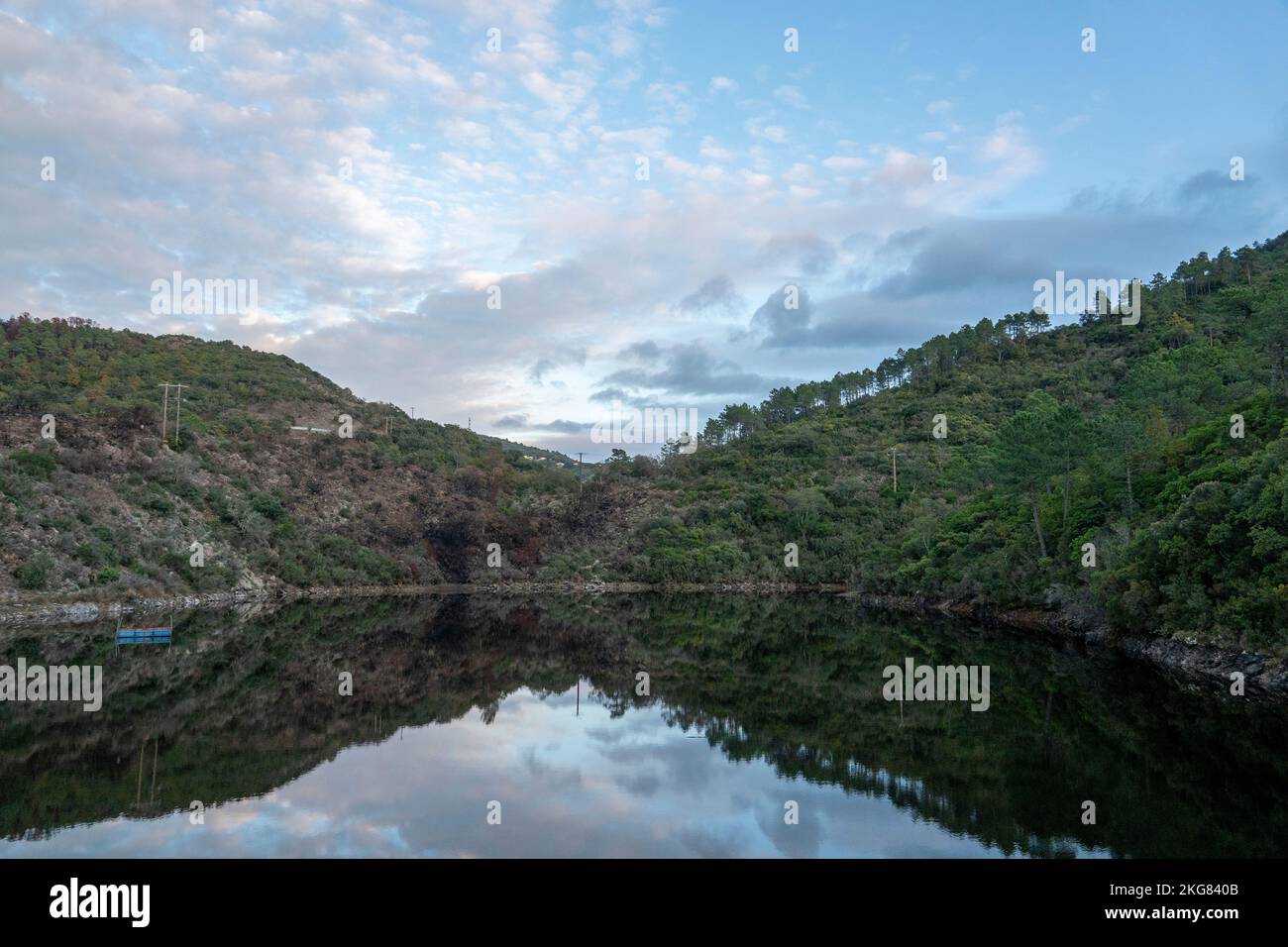 Vanadal water retention wiith clouds reflecting in the water, in la ...