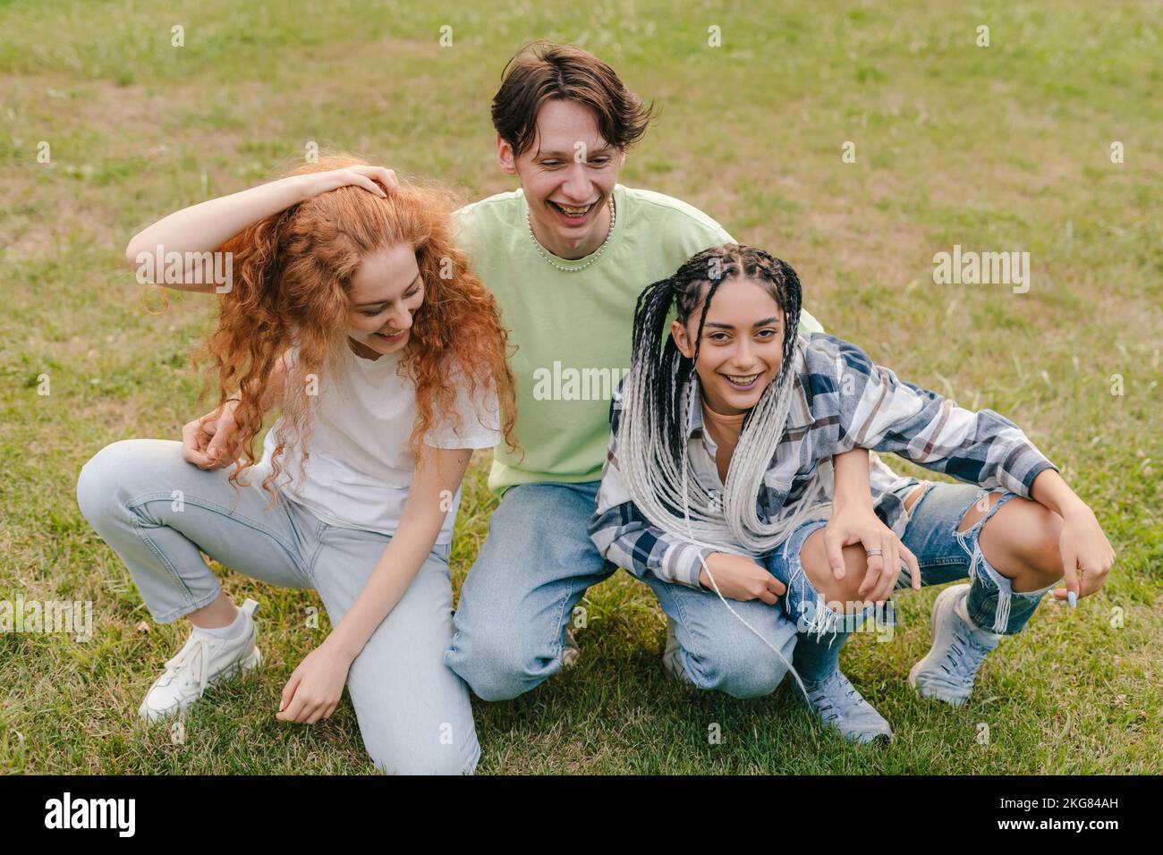 Happy teenage friends having fun together and posing for camera. Happy ...