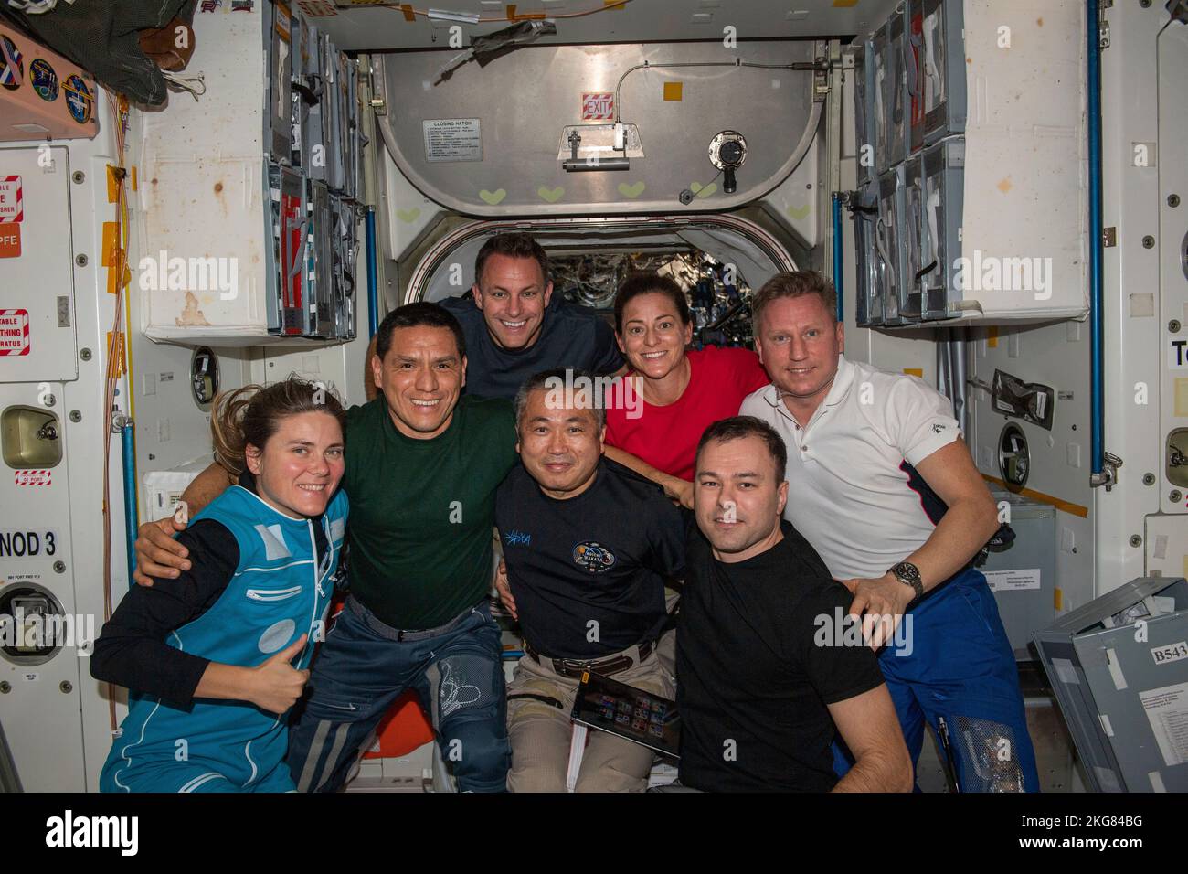 The seven Expedition 68 crew members join each other for a portrait ...