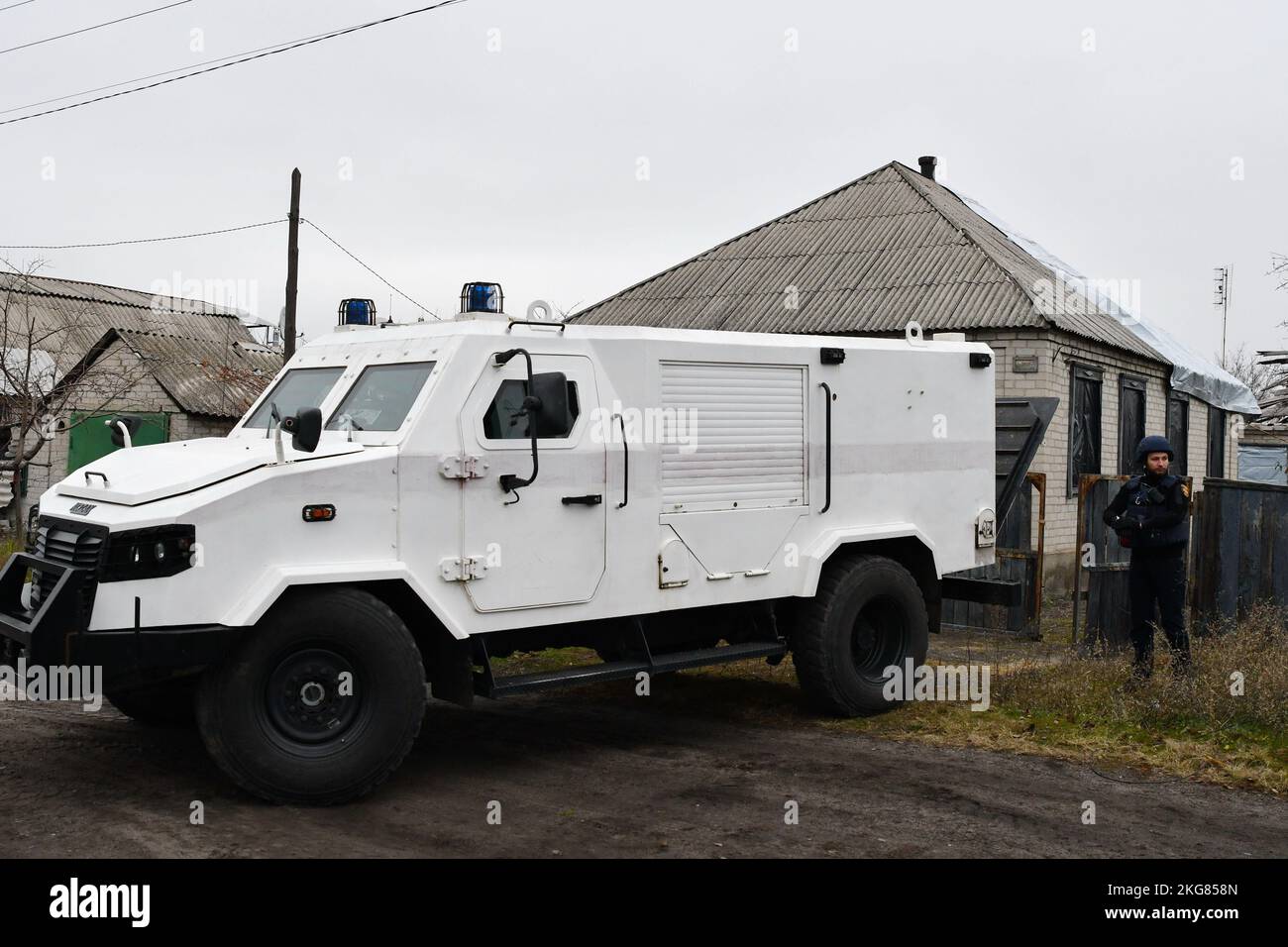 A Ukrainian sapper stands near the special armored vehicle during a ...